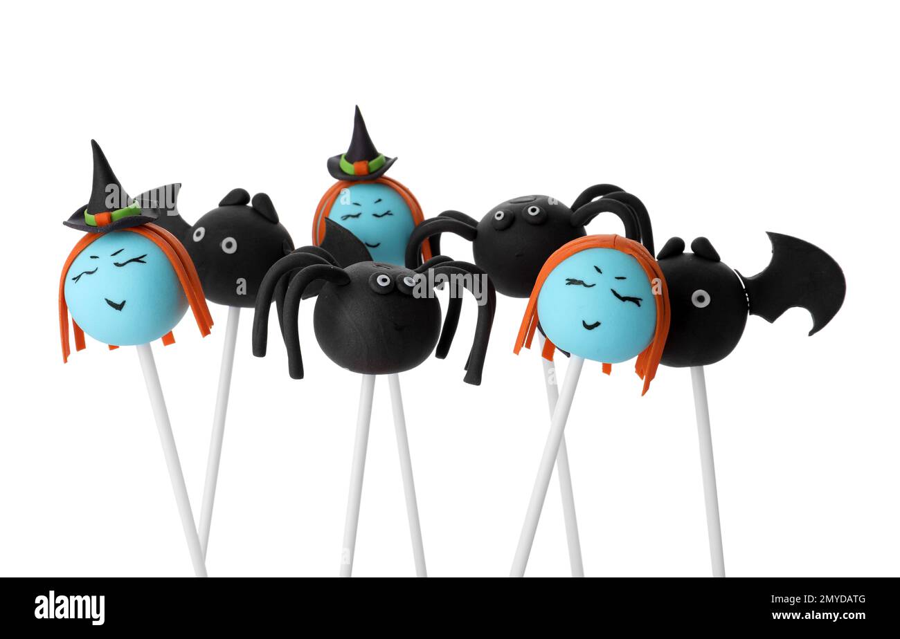 Different Halloween themed cake pops on white background Stock Photo ...