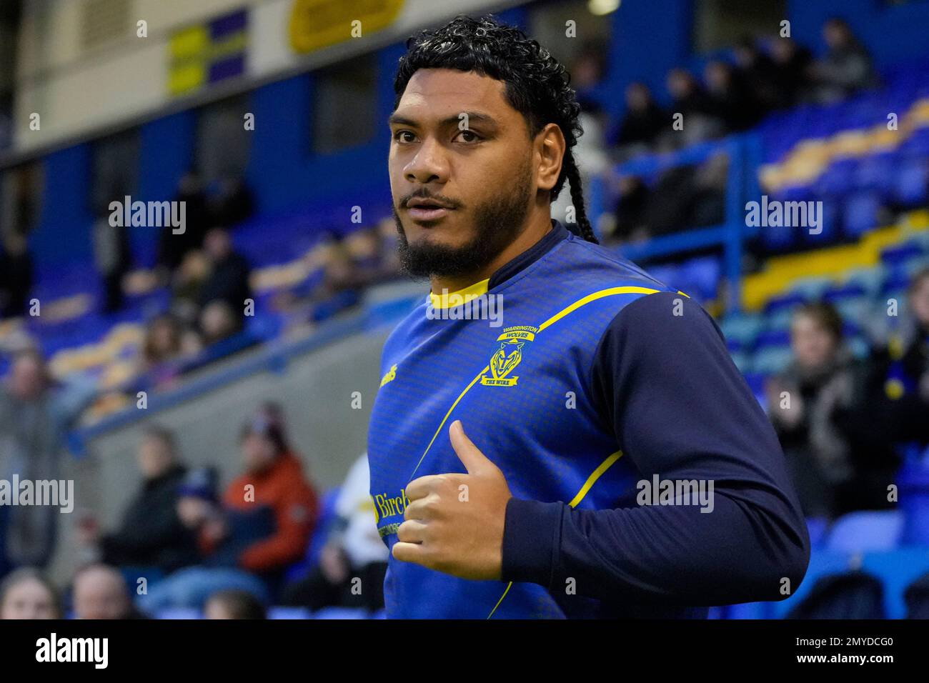Tom Mikaele #18 of Warrington Wolves during the warm-up before the ...