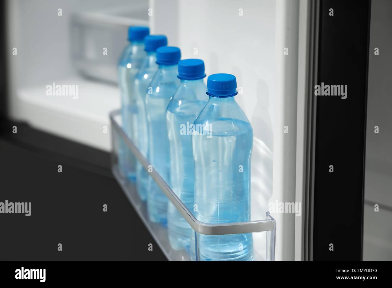 Bottle water in fridge hi-res stock photography and images - Alamy