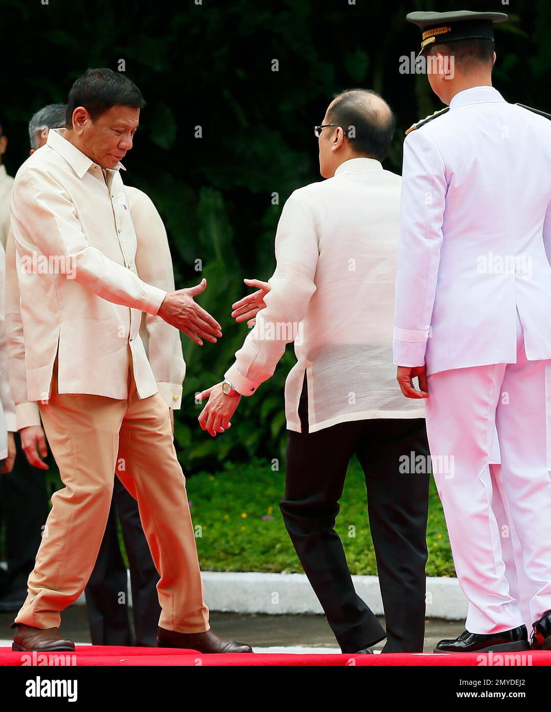 New Philippine President Rodrigo Duterte, left, and outgoing President ...
