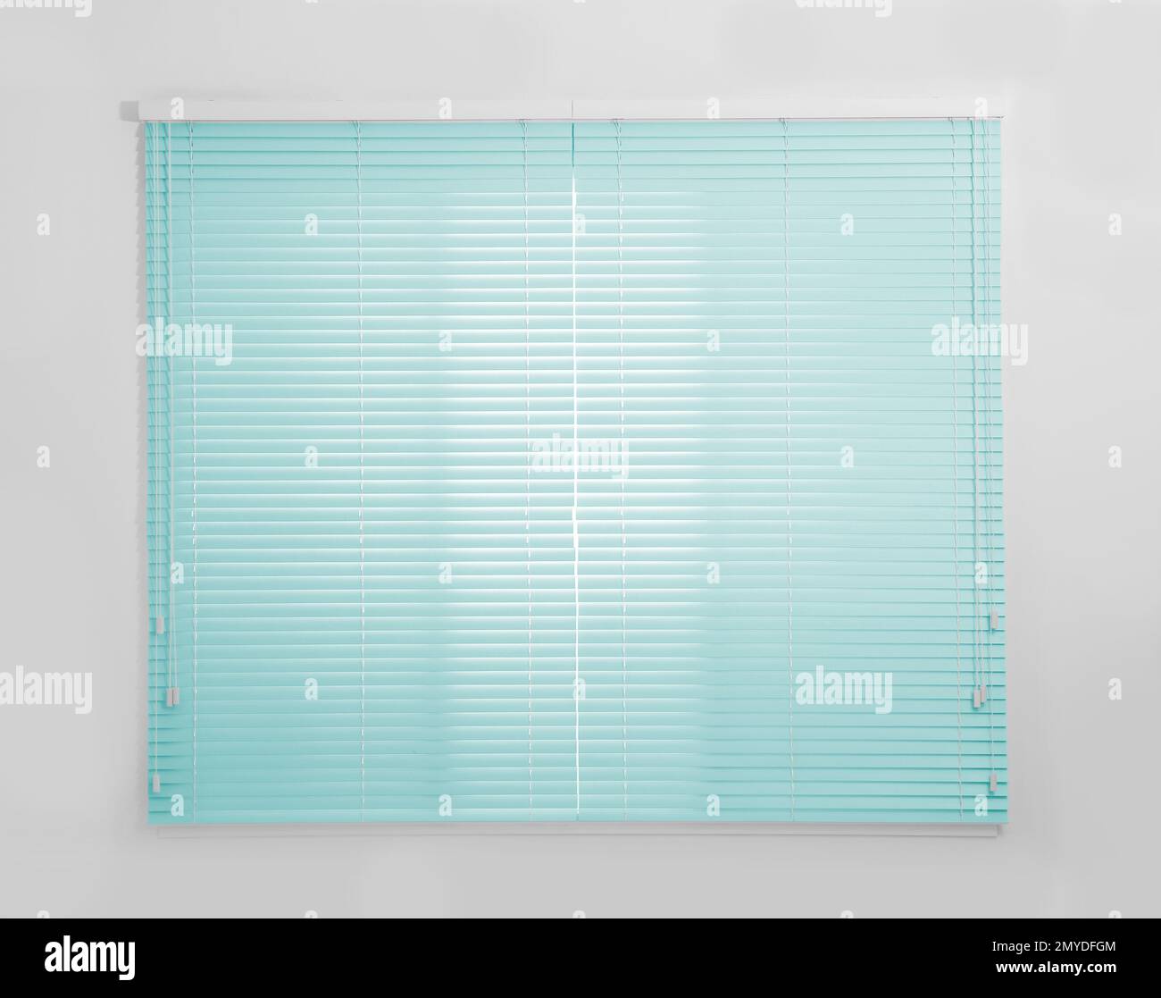 Window with closed turquoise blinds in room Stock Photo - Alamy