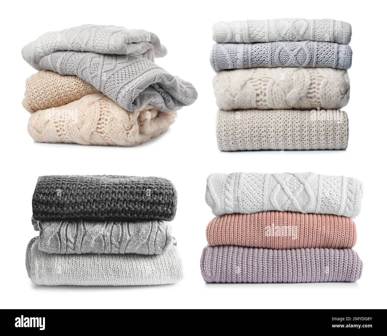 Set of folded and stacked sweaters on white background Stock Photo - Alamy
