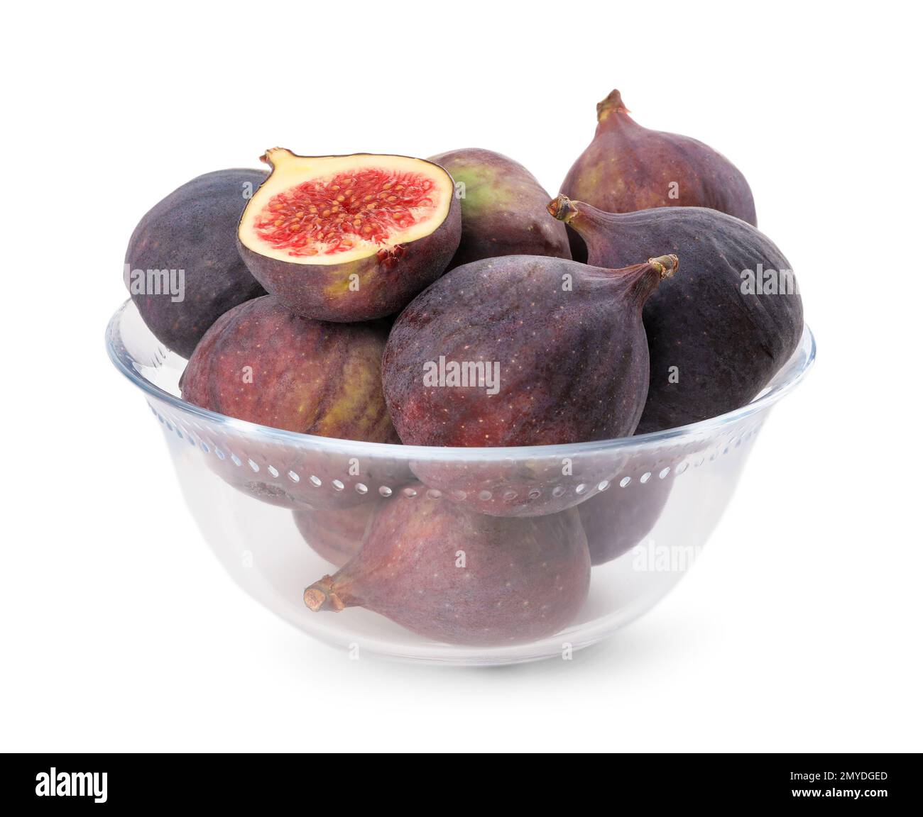Whole and cut tasty fresh figs in glass bowl isolated on white Stock ...