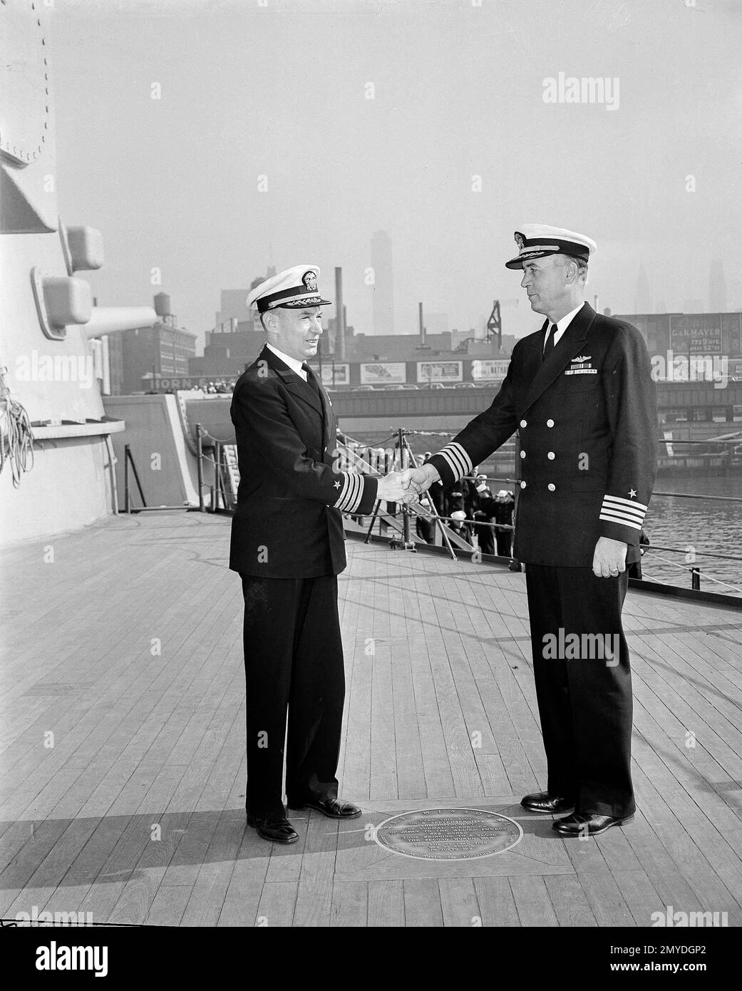 Capt. Stuart S. Murray, right, former captain of the giant battleship ...