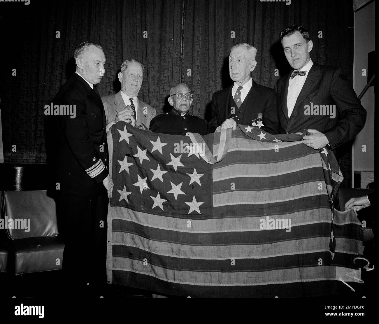 The commission pennant and boat ensign of the historic battleship Maine ...