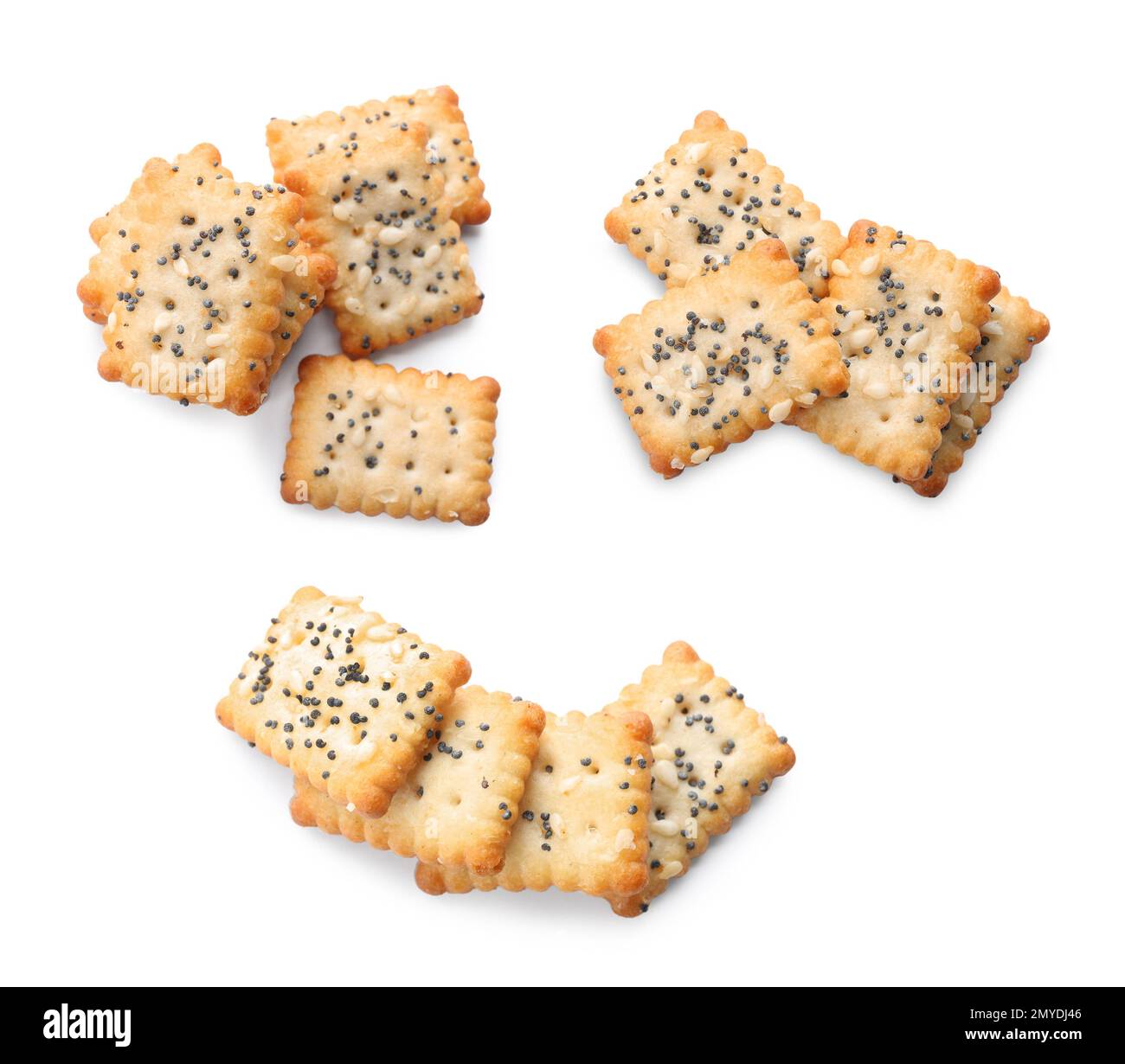 Set of tasty crispy crackers with poppy and sesame seeds on white background, top view Stock ...