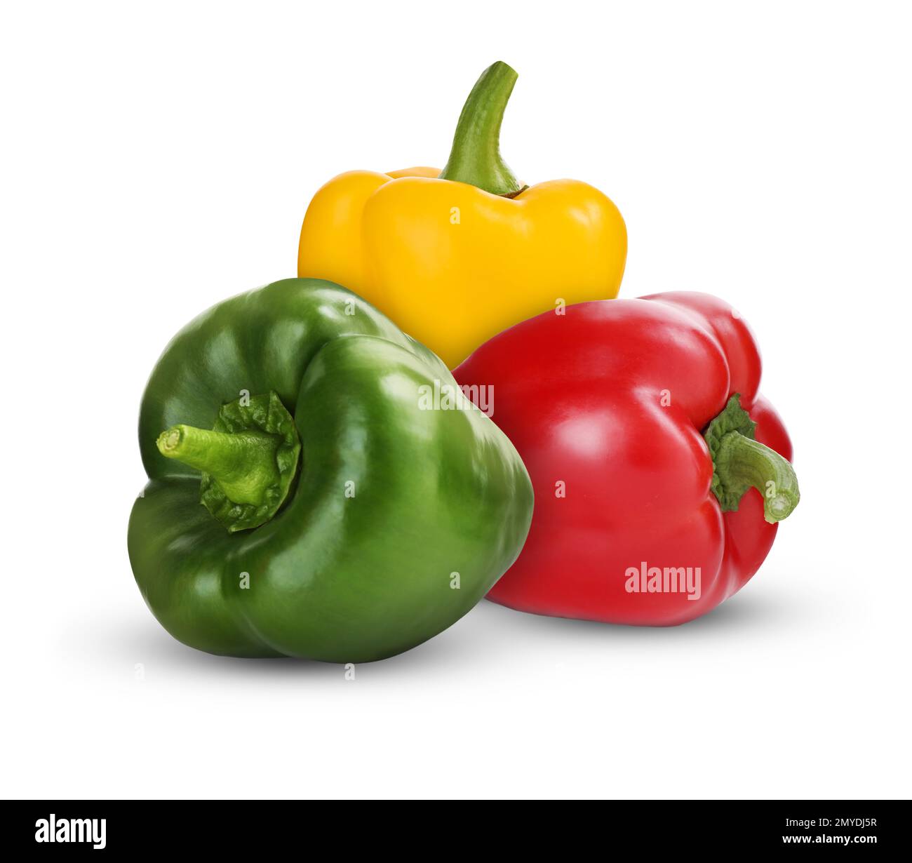 Fresh whole bell peppers on white background Stock Photo - Alamy