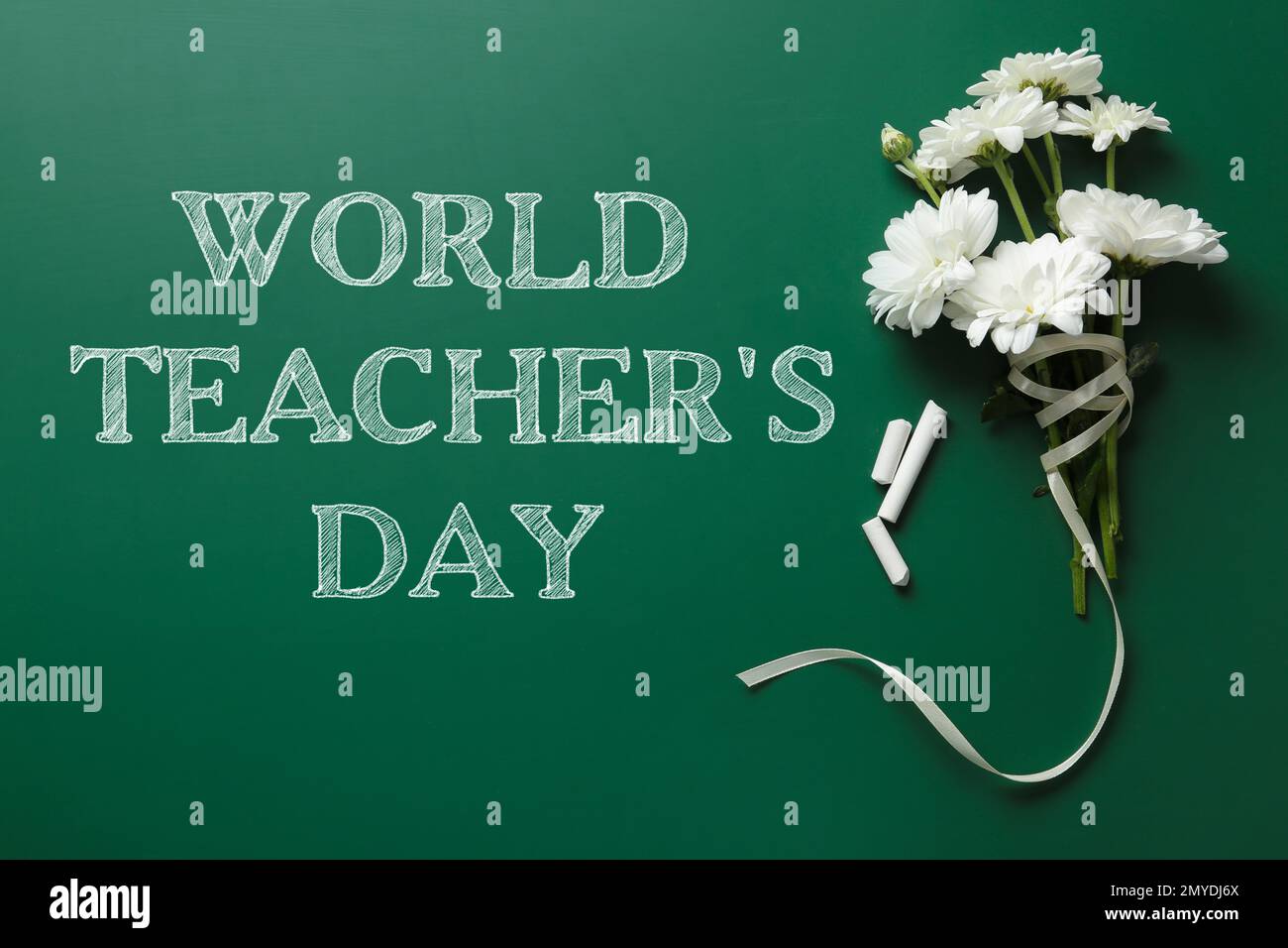 Text World Teacher's Day, chalk and bouquet on greenboard, top view ...