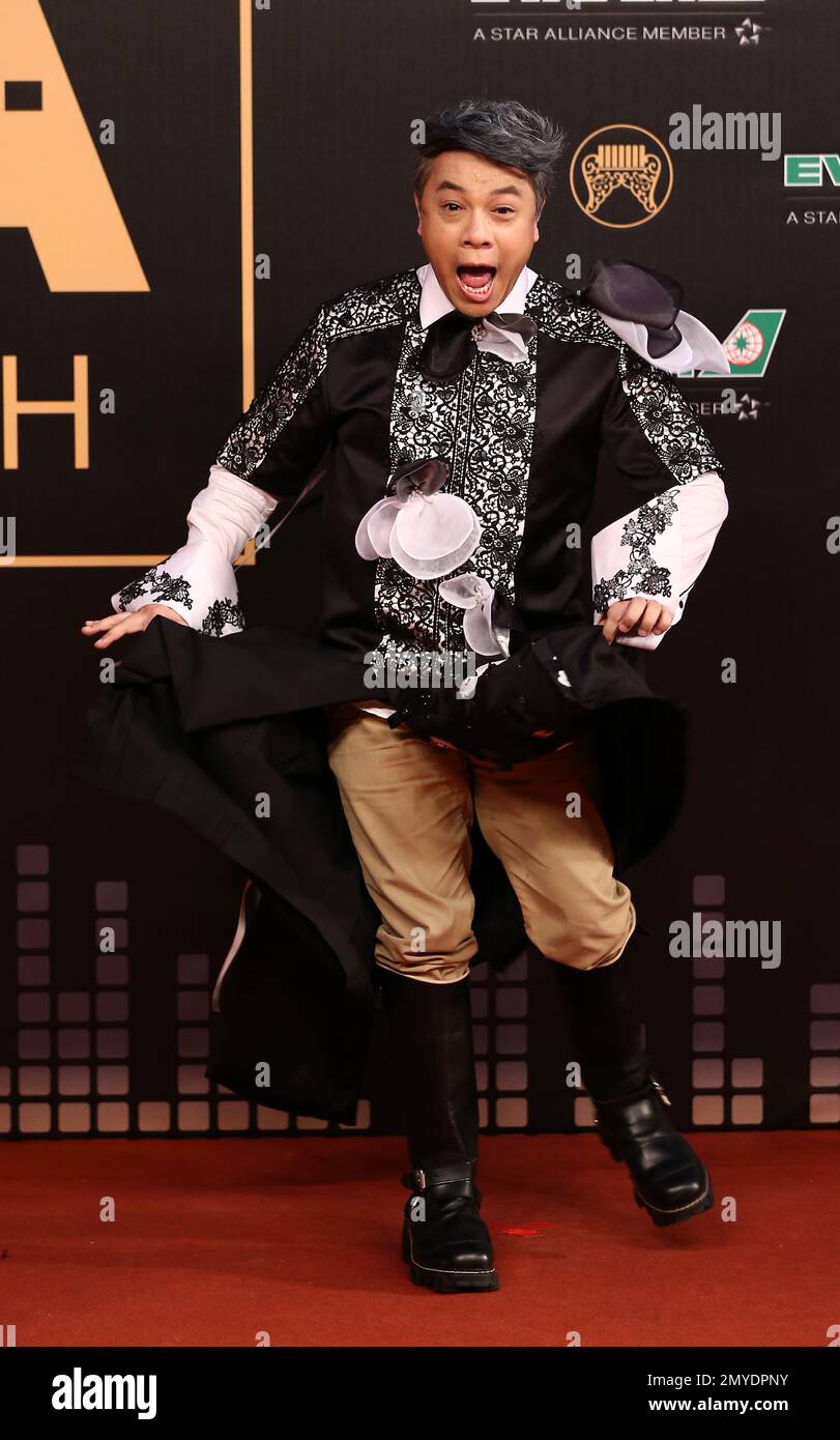 Taiwanese host Kevin Tsai poses as he arrives at the 27th Golden Melody ...