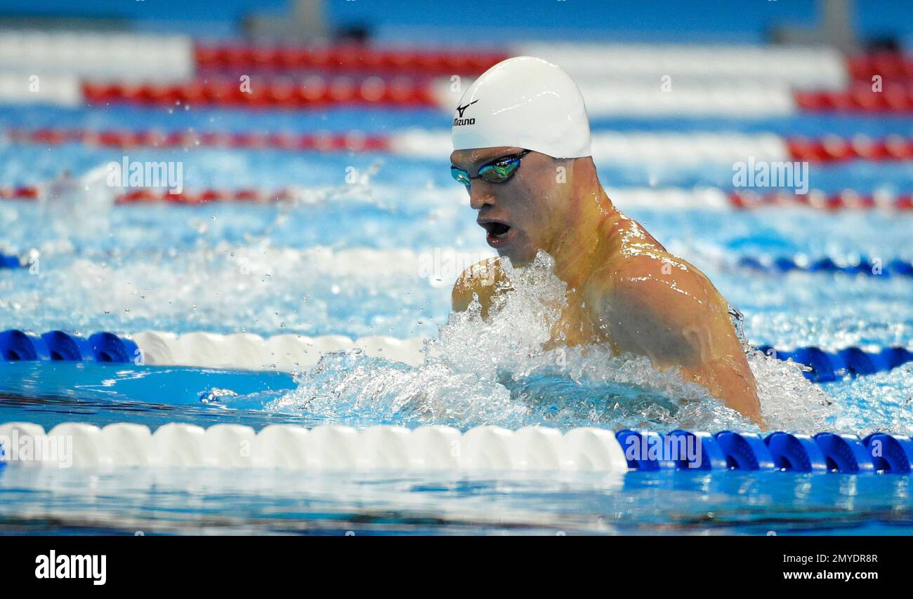 Kevin Cordes swims during the men's 100-meter breaststroke final at the ...