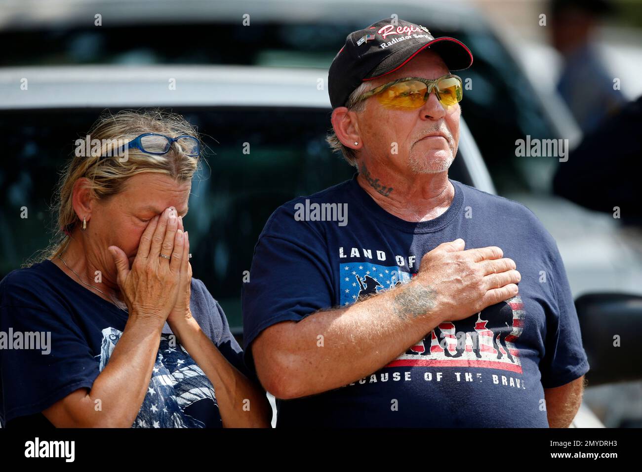 Rickey and Natalie Breaux, who live near the cemetery, pay their ...