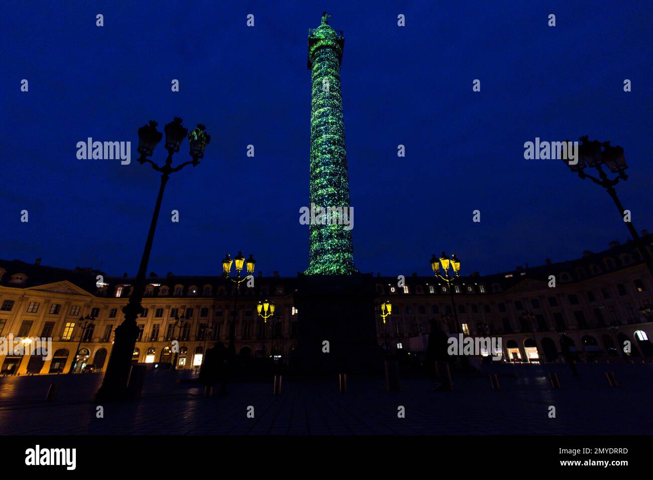 The newly renovated Place Vendome column is illuminated during the ...