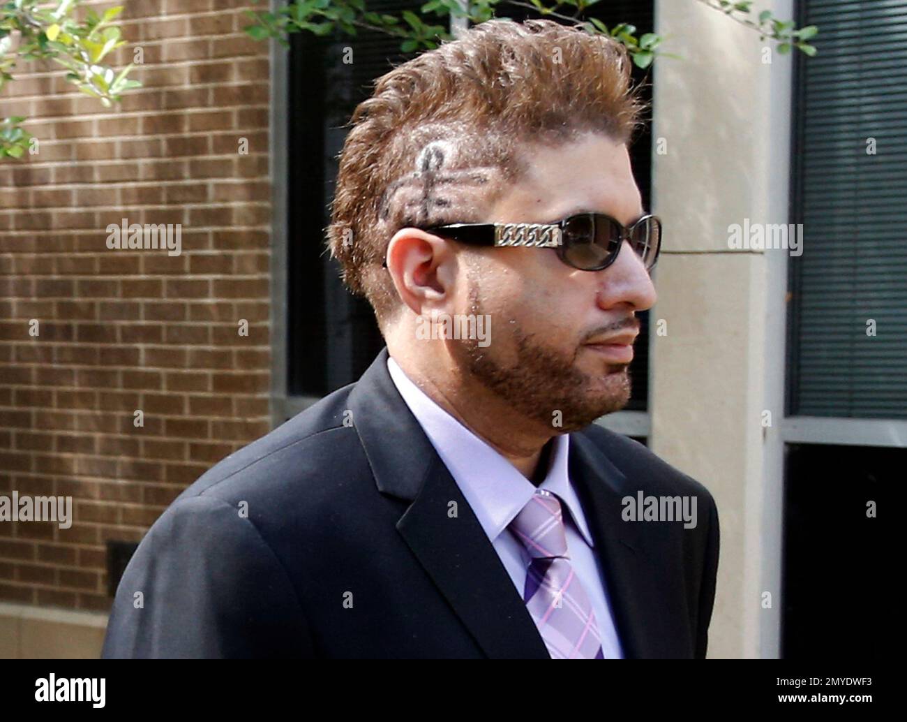 Omarr Baker, the half-brother of Prince, wearing the Prince symbol ...