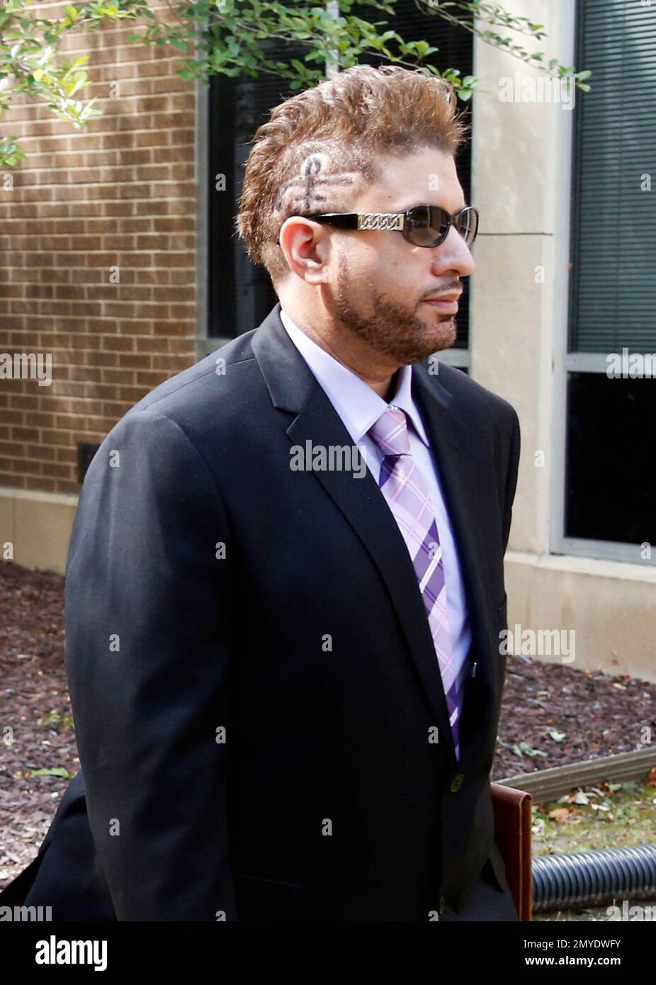 Omarr Baker, the half-brother of Prince, wearing the Prince symbol ...