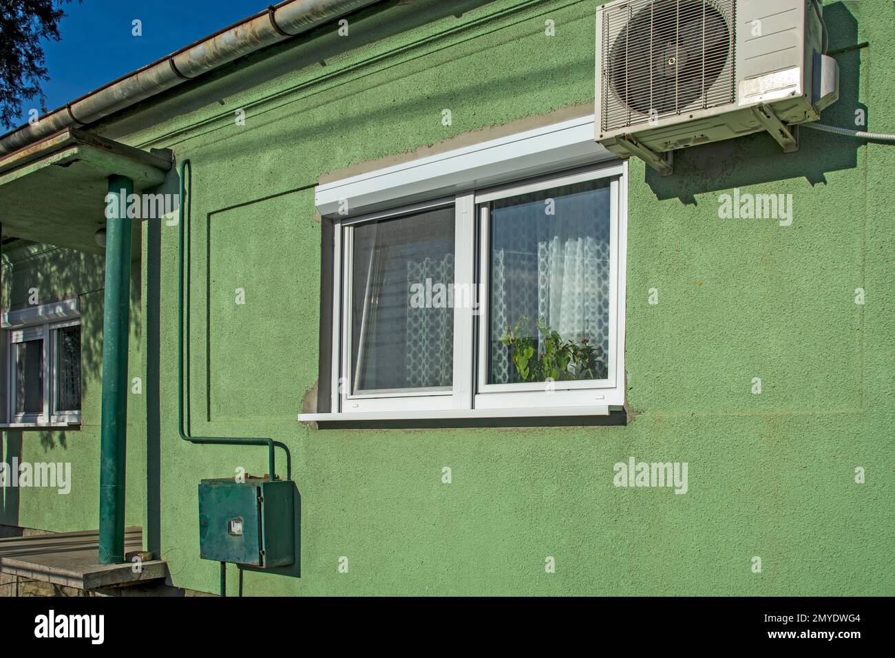 A new modern window was installed on the house instead of a wooden one ...