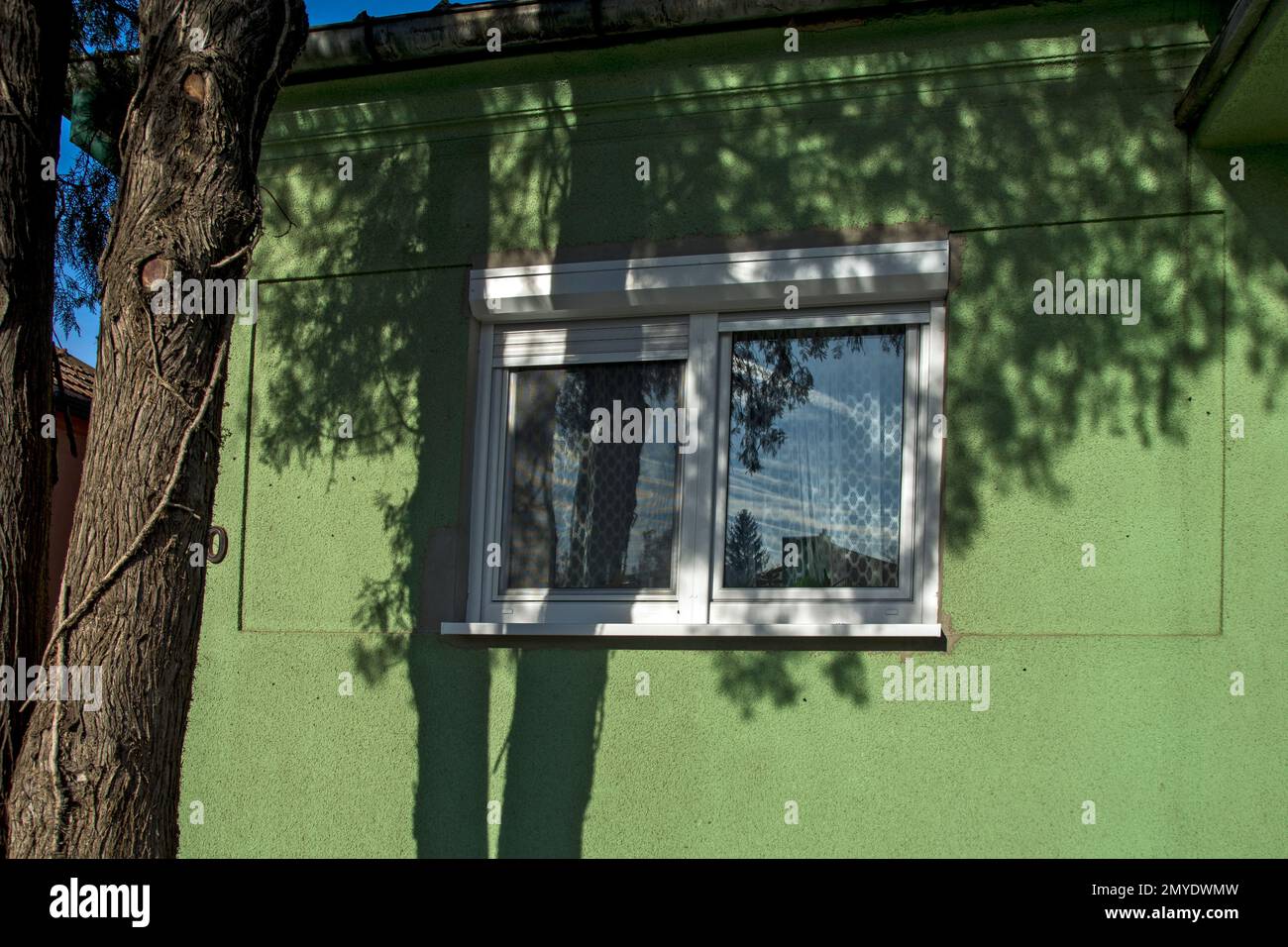A new modern window was installed on the house instead of a wooden one ...