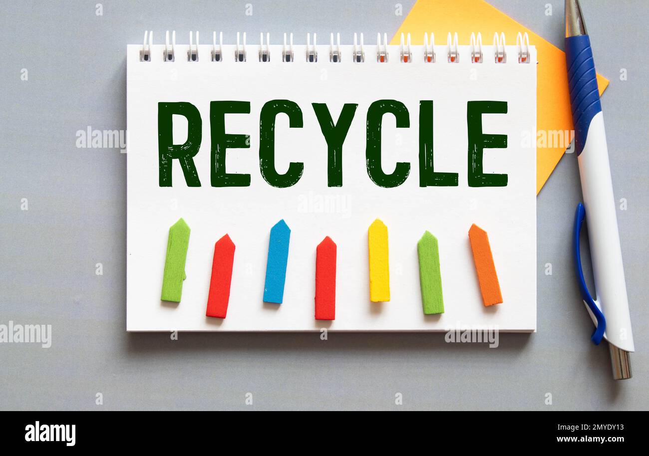 Recyclable packaging text on craft paper bag. Recycled pack Stock Photo ...