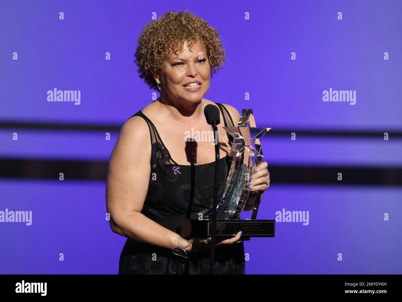 Debra Lee, Chairman and CEO of BET, presents the humanitarian award at ...