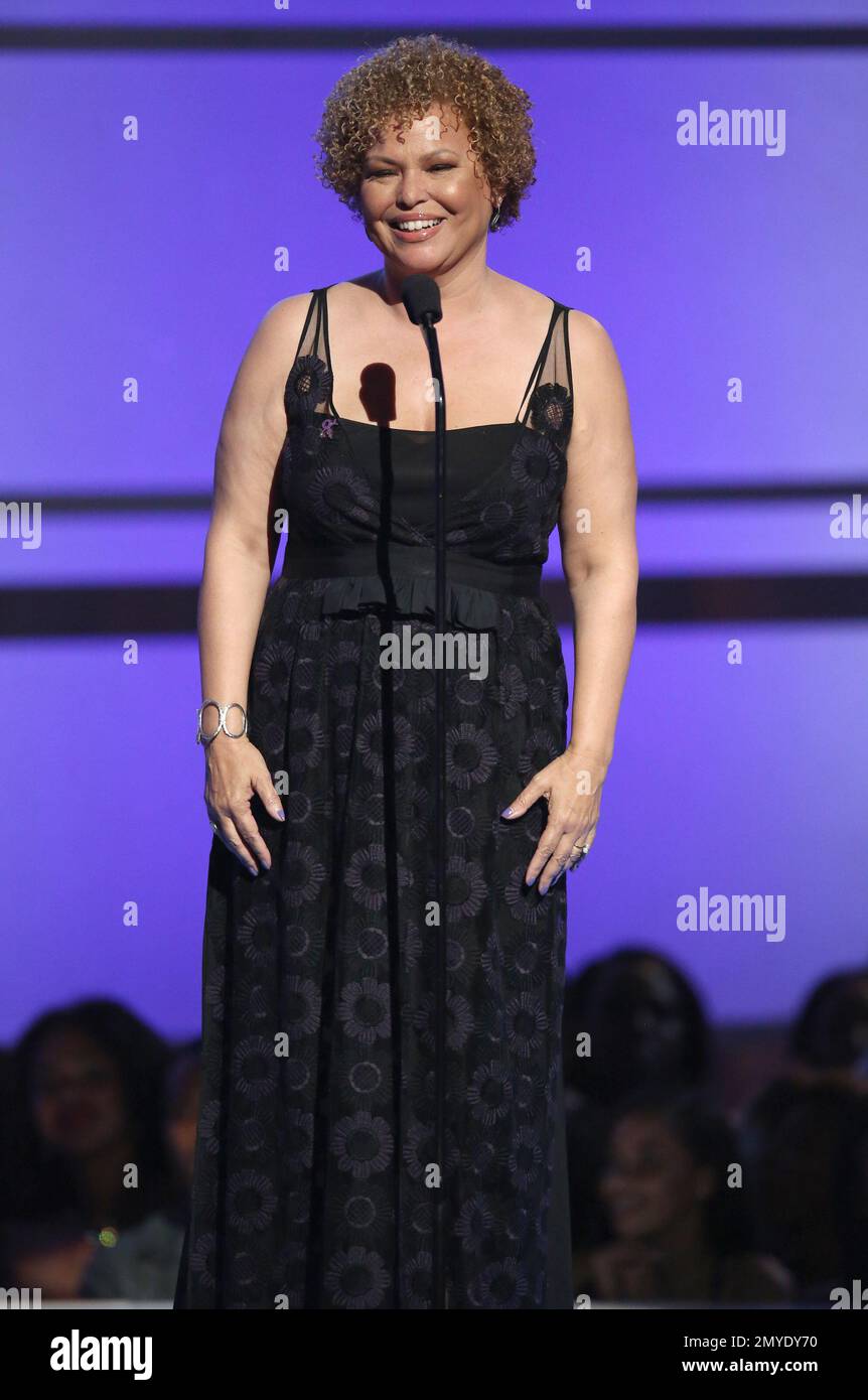 Debra Lee, BET chairman and CEO, presents the humanitarian award at the ...