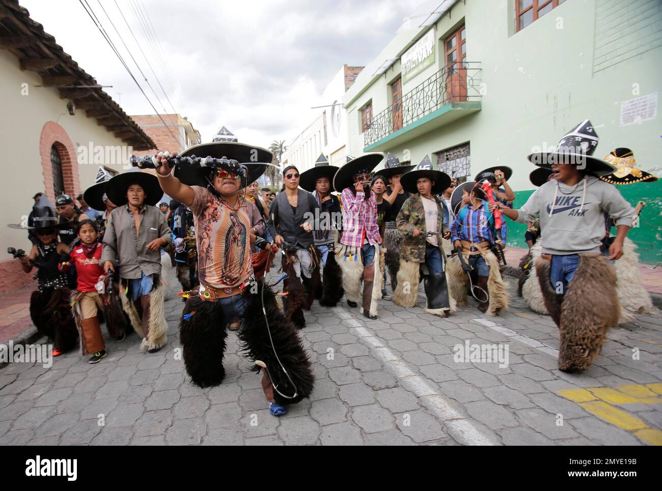 CORRECTS QETCHUA TO QUECHUAPeople from the town of Batan arrive ...