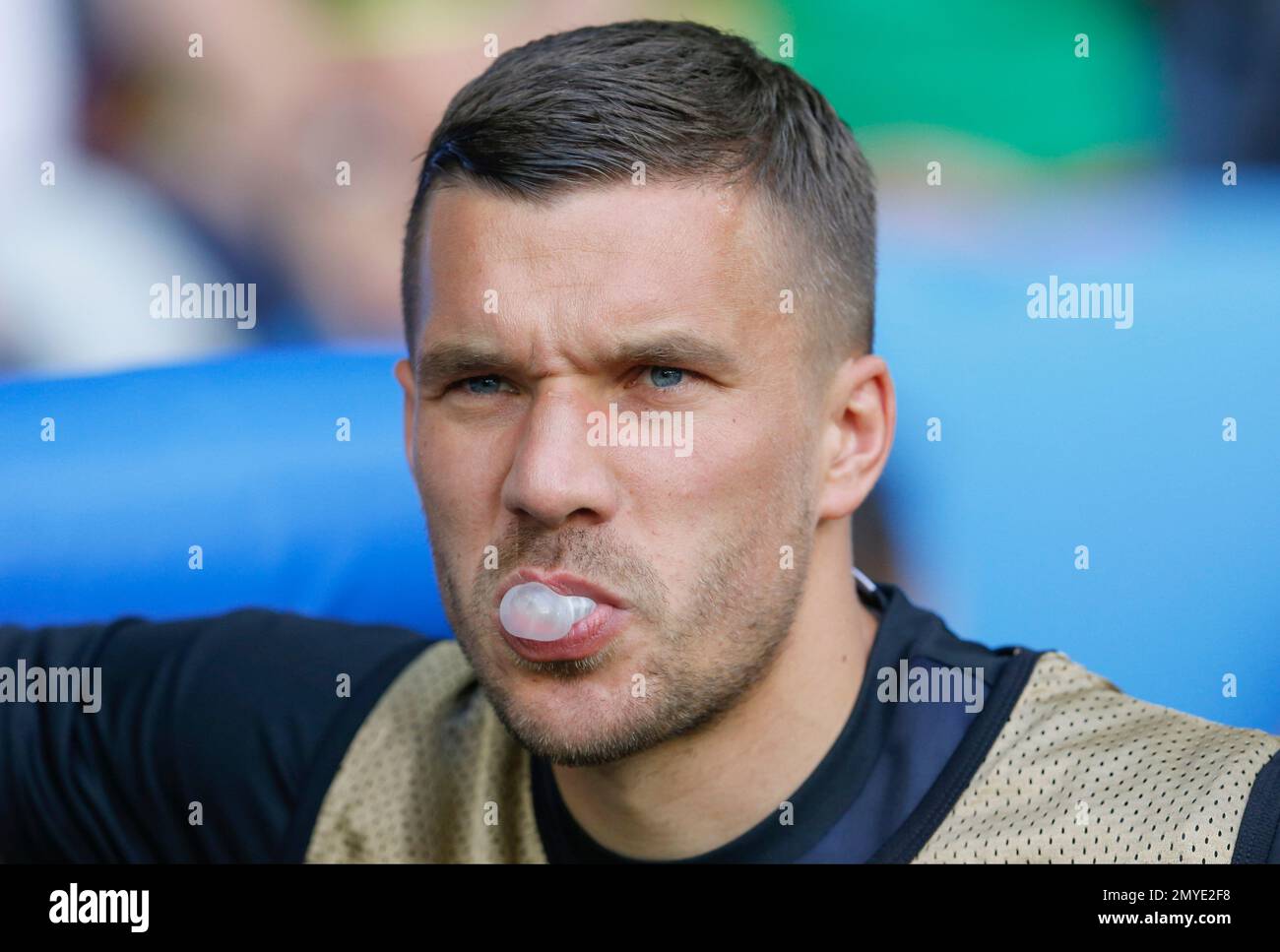 Germany's Lukas Podolski stands by the bench before the Euro 2016 round ...