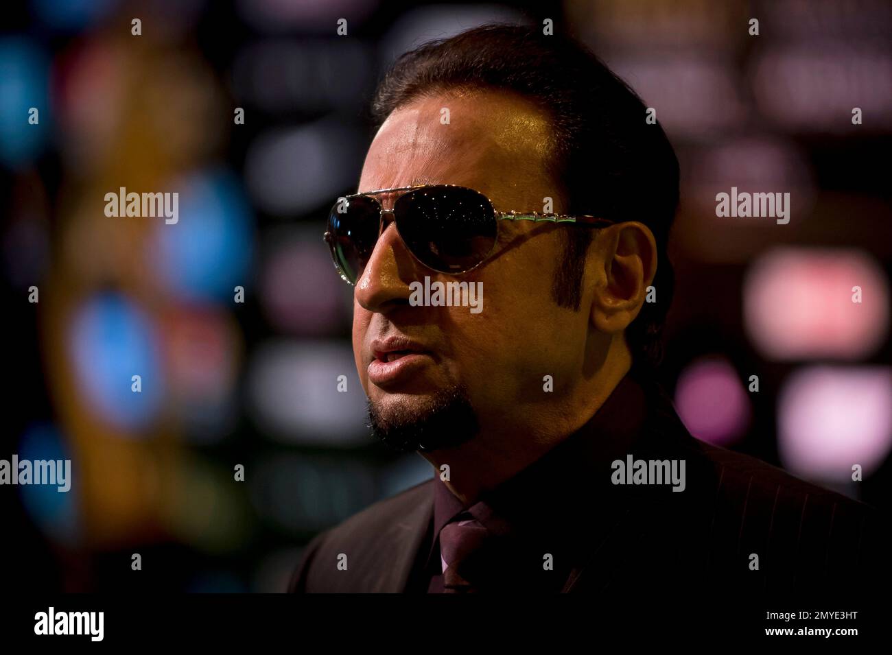 Bollywood actor Gulshan Grover poses for photographers at the ...