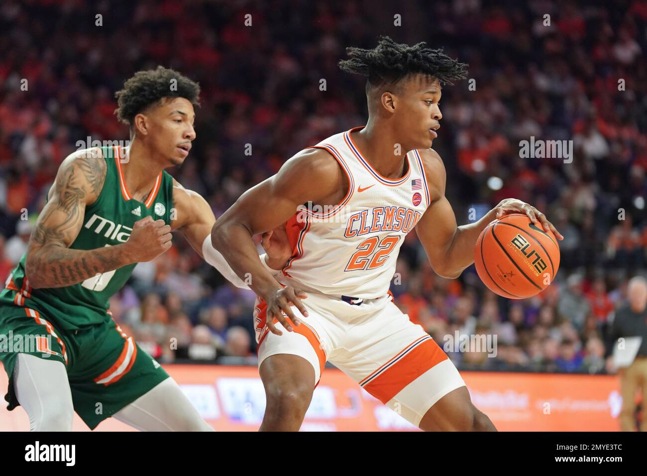 Clemson forward RJ Godfrey (22) dribbles against Miami guard Jordan ...