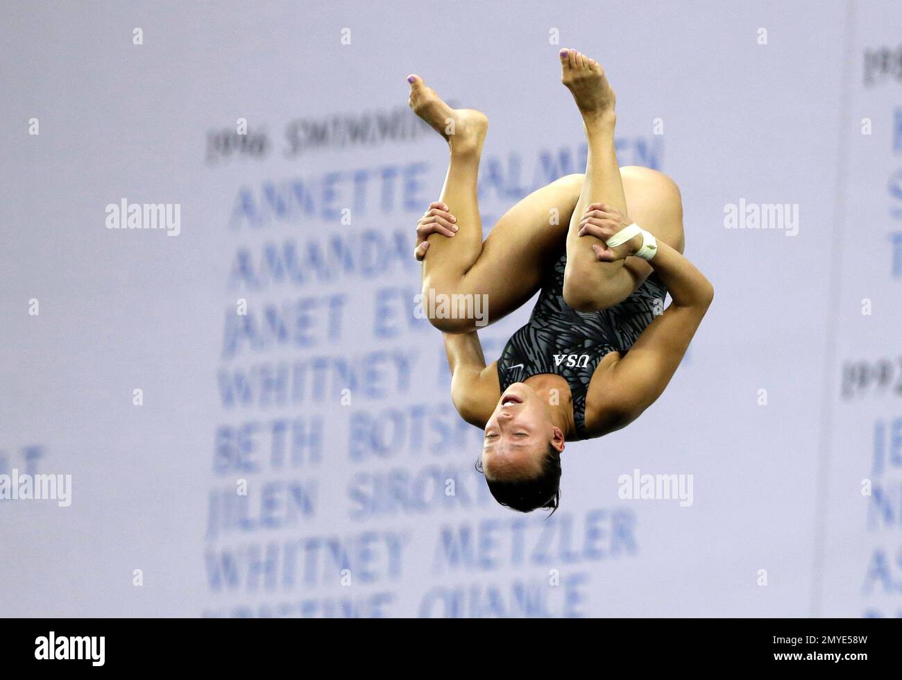 Jessica Parratto performs a dive during the women's 10-meter platform ...