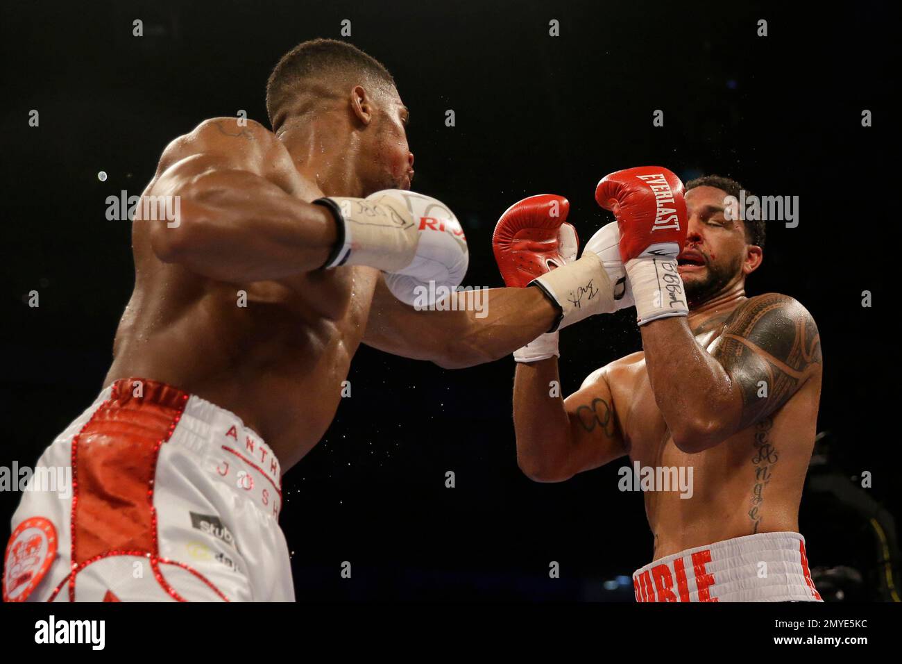 British boxer Anthony Joshua, left, fights U.S. boxer Dominic Breazeale ...