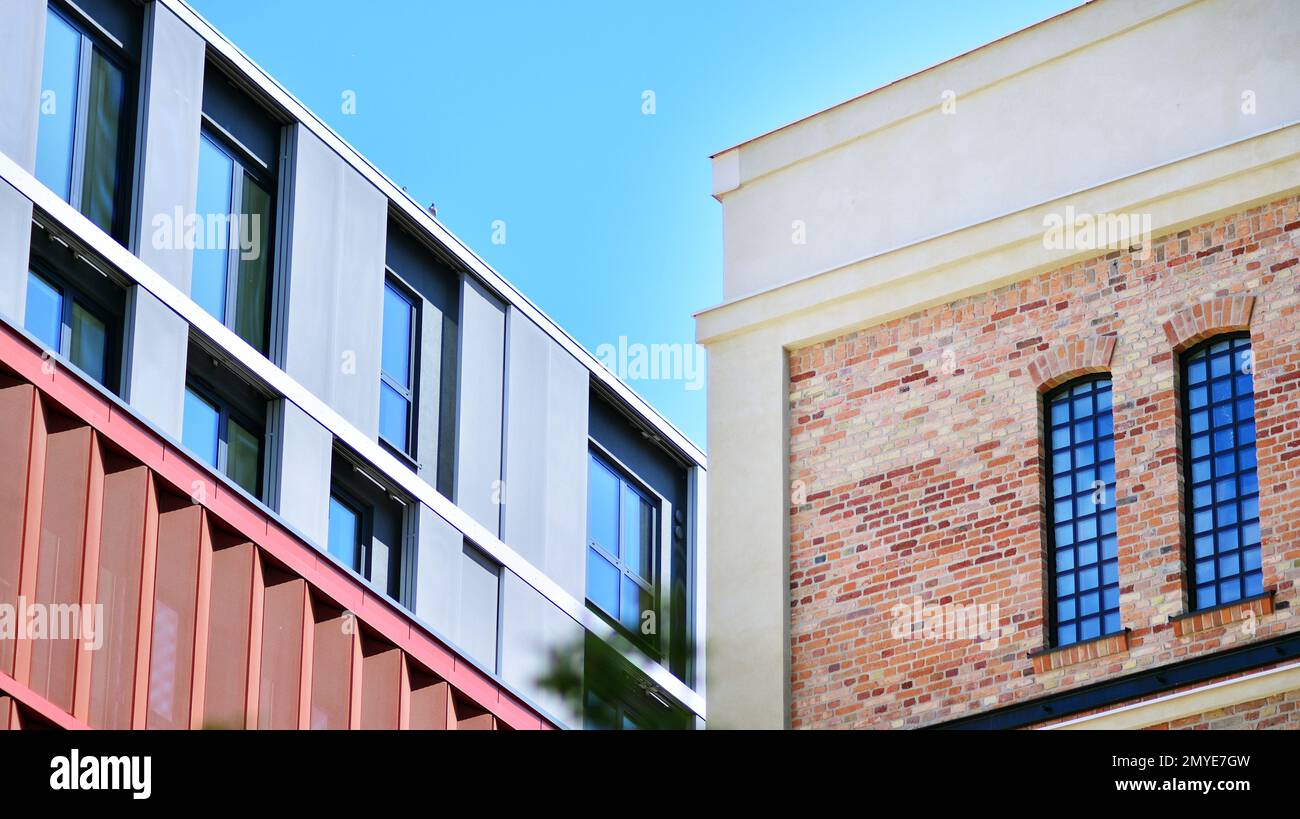 View of an modern apartment building standing next to a new modern ...