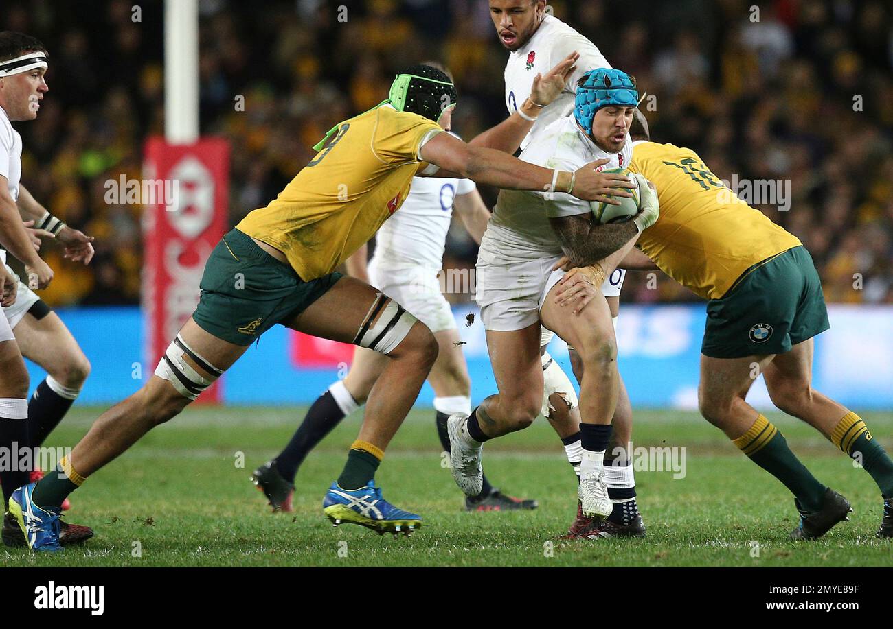 England's Jack Nowell center, tries to break through Australia's Adam ...