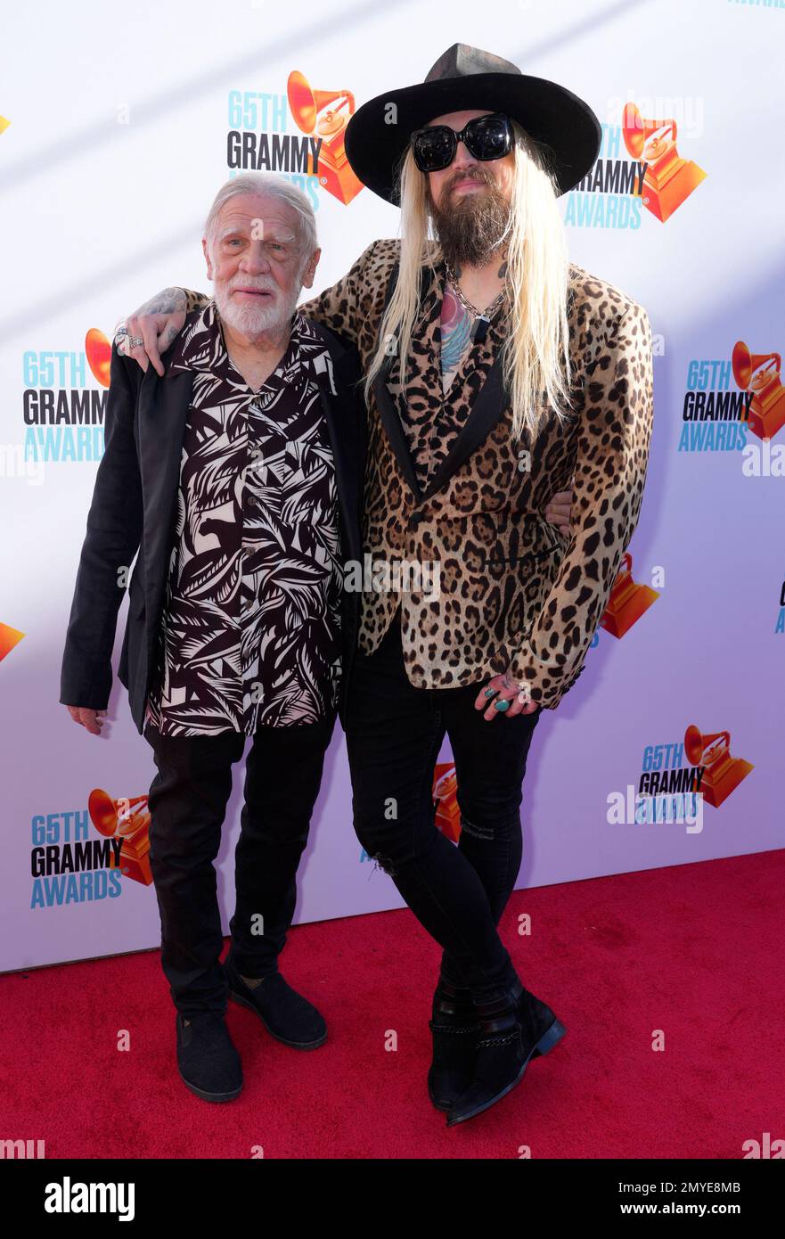 Henry Diltz, left, and Nick Diltz arrive at the Recording Academy's ...