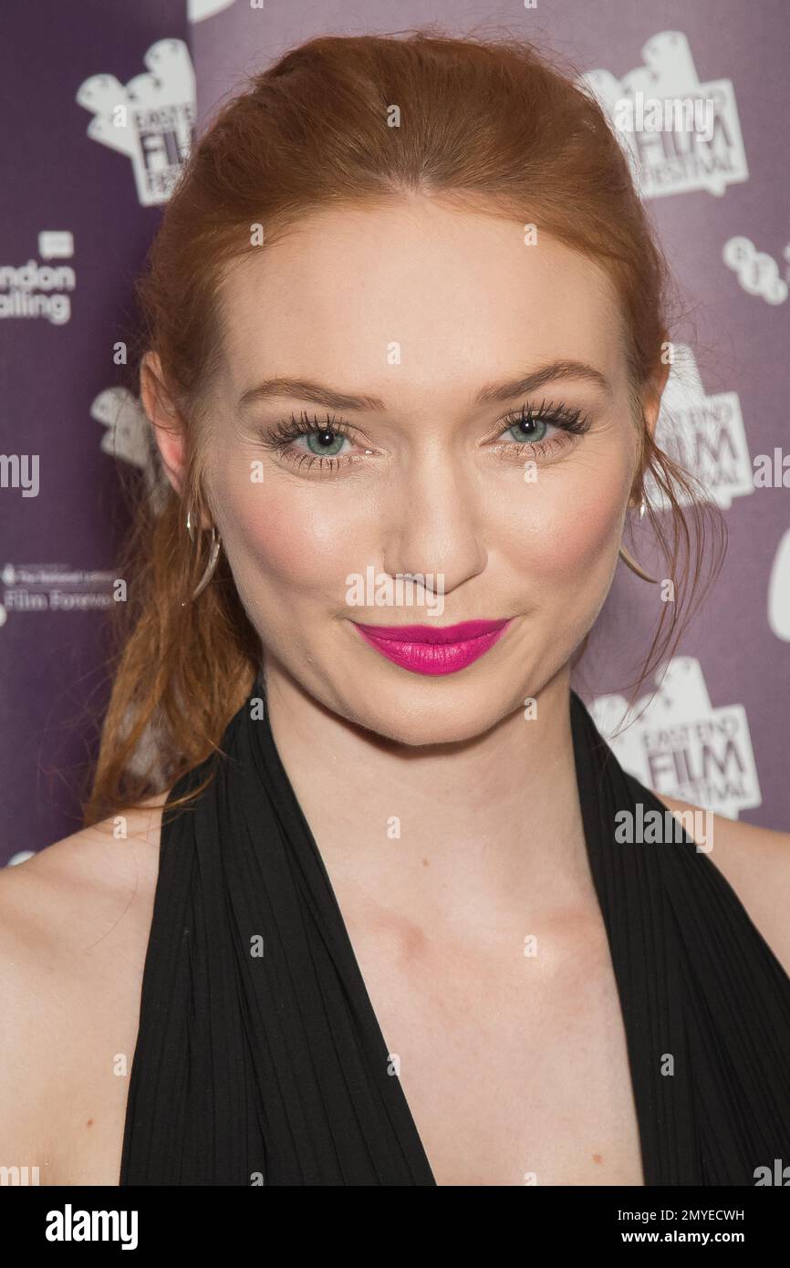 Actress Eleanor Tomlinson poses for photographers upon arrival at the ...