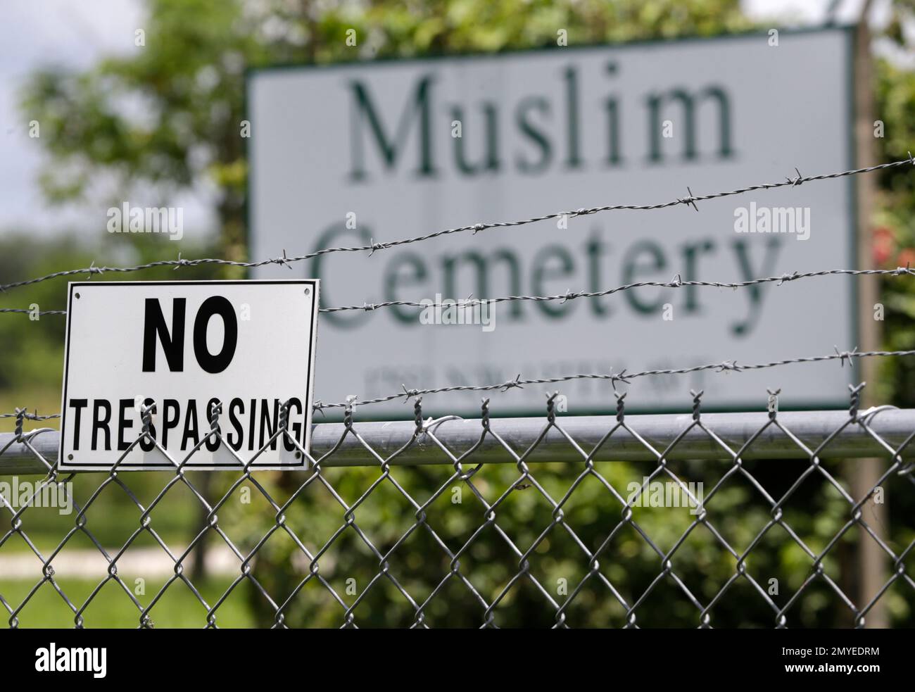 A "No Trespassing" sign is posted outside the Muslim Cemetery of South ...