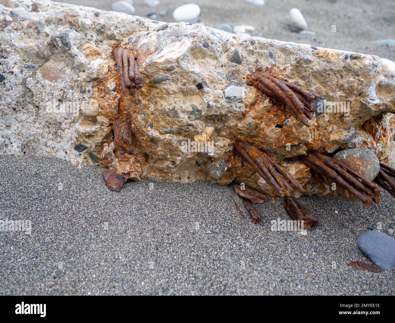 Reinforced concrete. Destroyed building material. Rusty iron ...