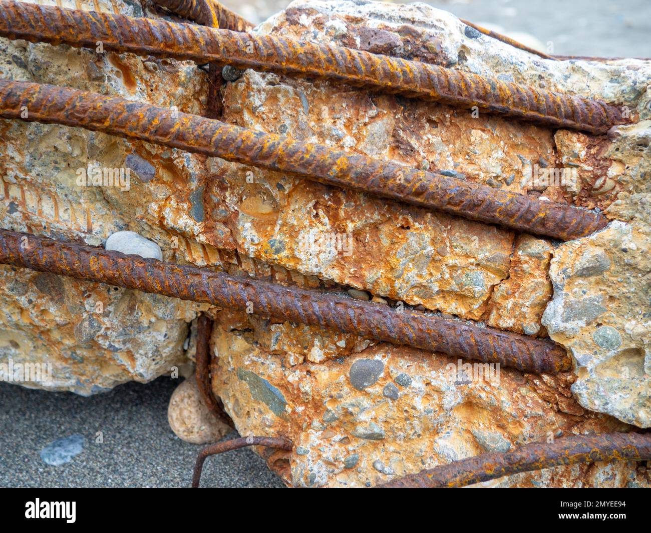 Reinforced concrete. Destroyed building material. Rusty iron ...