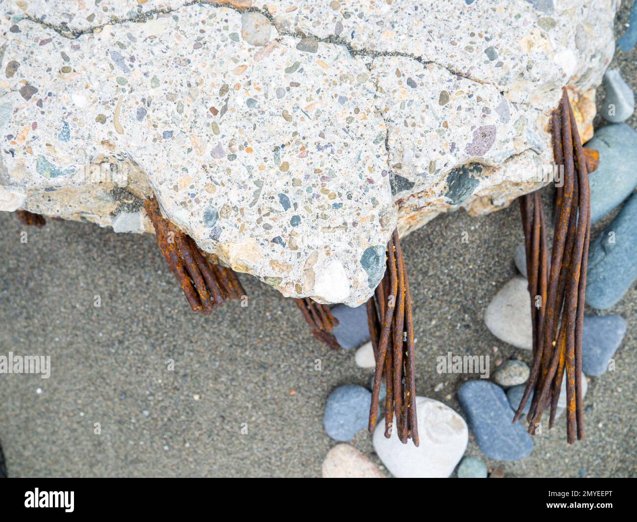 Reinforced concrete. Destroyed building material. Rusty iron ...