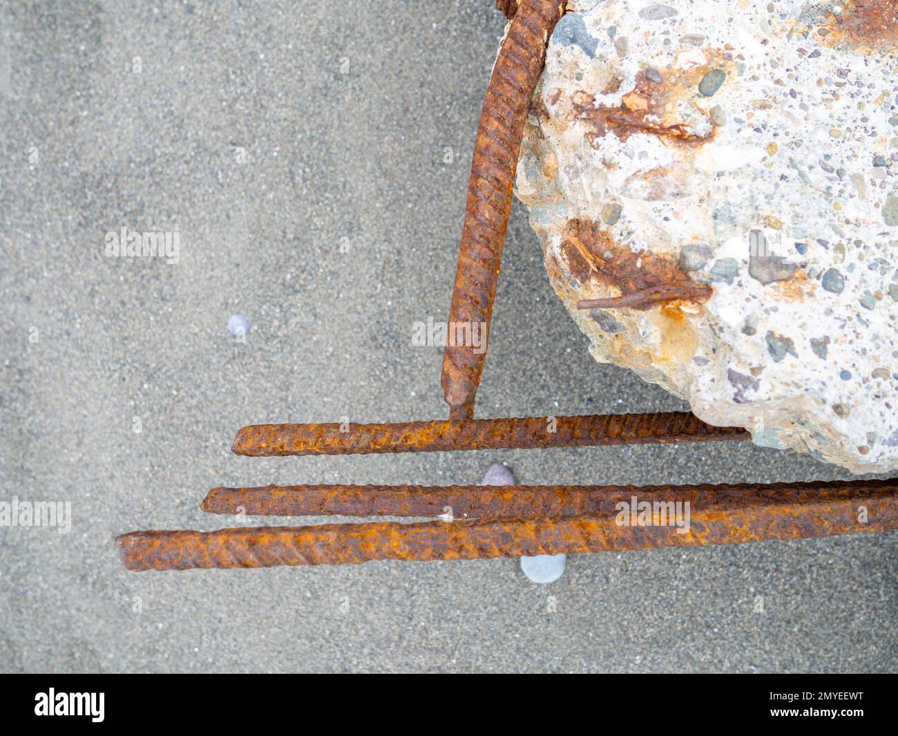 Reinforced concrete. Destroyed building material. Rusty iron ...