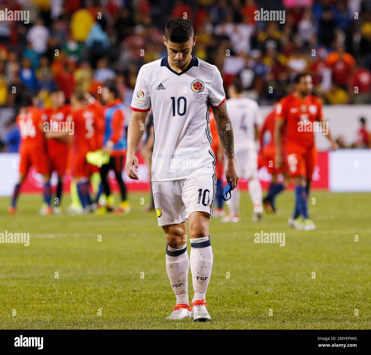 Colombia's James Rodriguez (10) leaves the pitch after Chile won the ...
