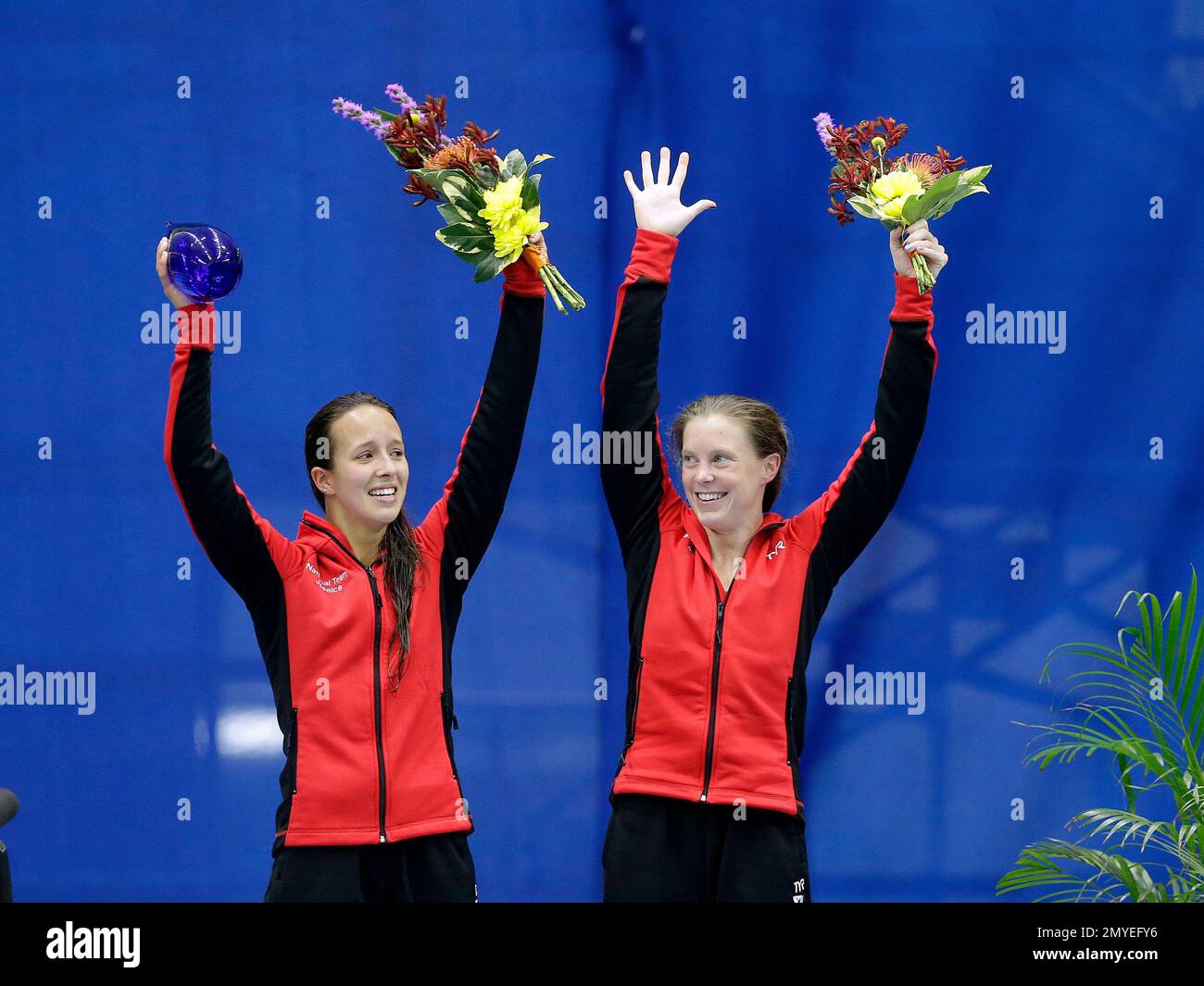 Jessica Parratto and Amy Cozad celebrate after winning the synchronized ...