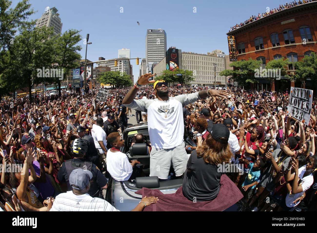 Cleveland Cavaliers' LeBron James, center, stands in the back of a ...