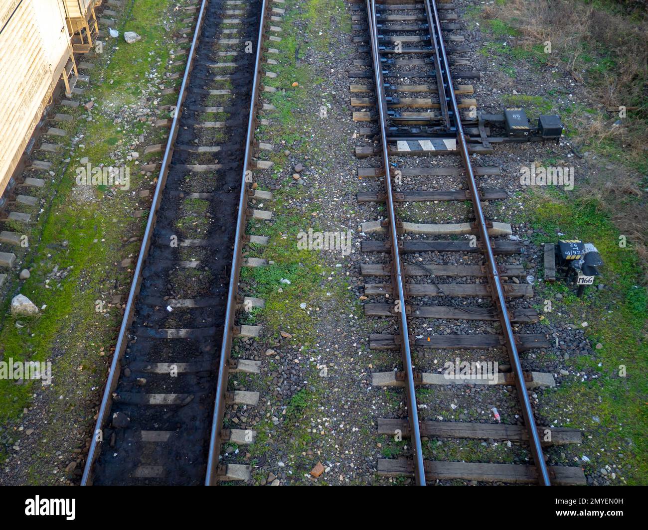 Old railway tracks. View from above. Railway in the moss. Road concept ...