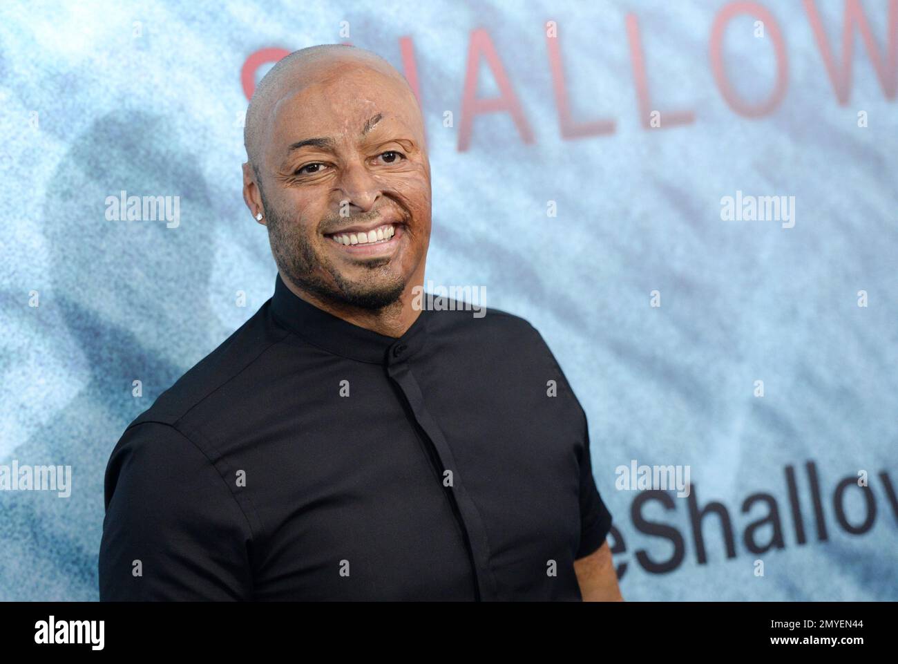 J.R. Martinez attends the world premiere of "The Shallows" at AMC Loews ...