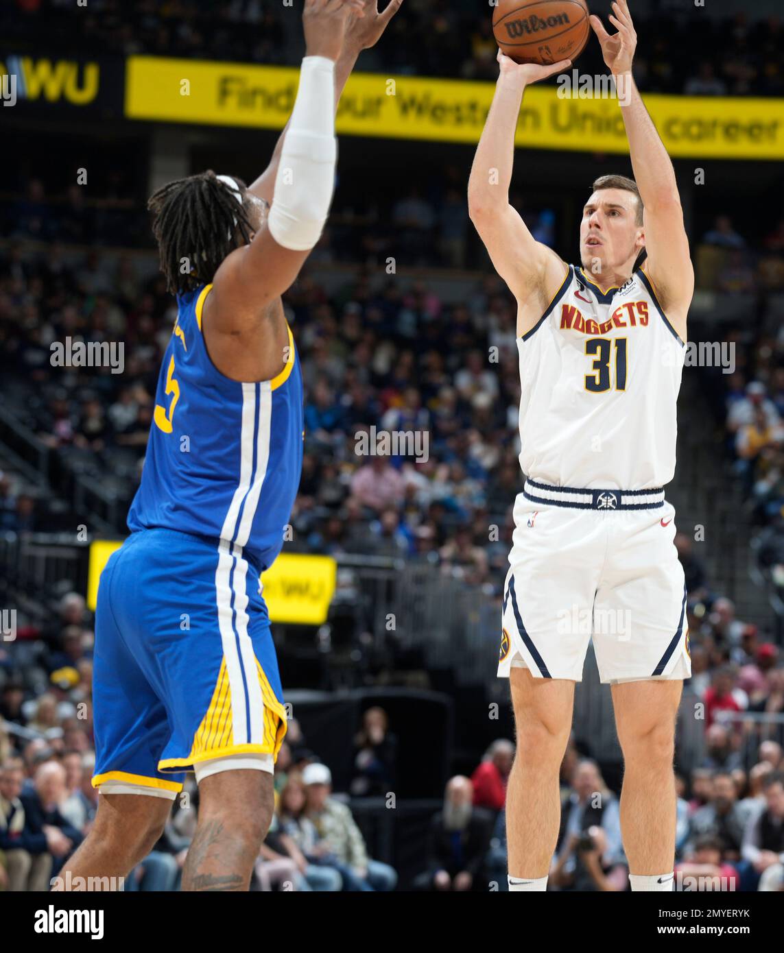 Denver Nuggets forward Vlatko Cancar (31) shoots over Golden State ...