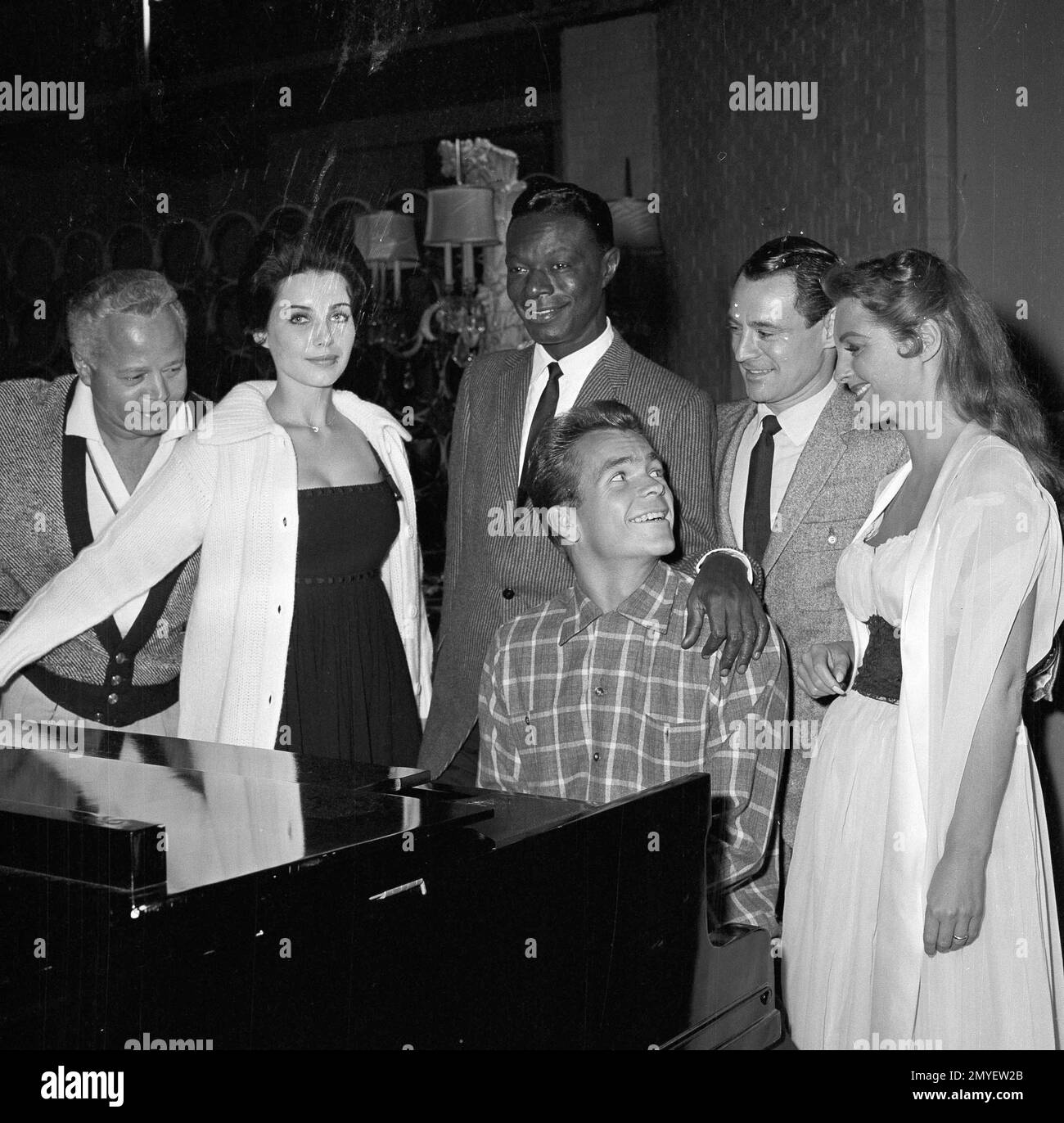 Singing stars put their voices together for members of the cast of a ...