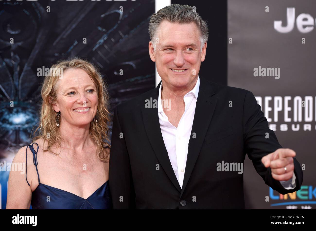 Tamara Hurwitz, left, and Bill Pullman arrive at the premiere of ...