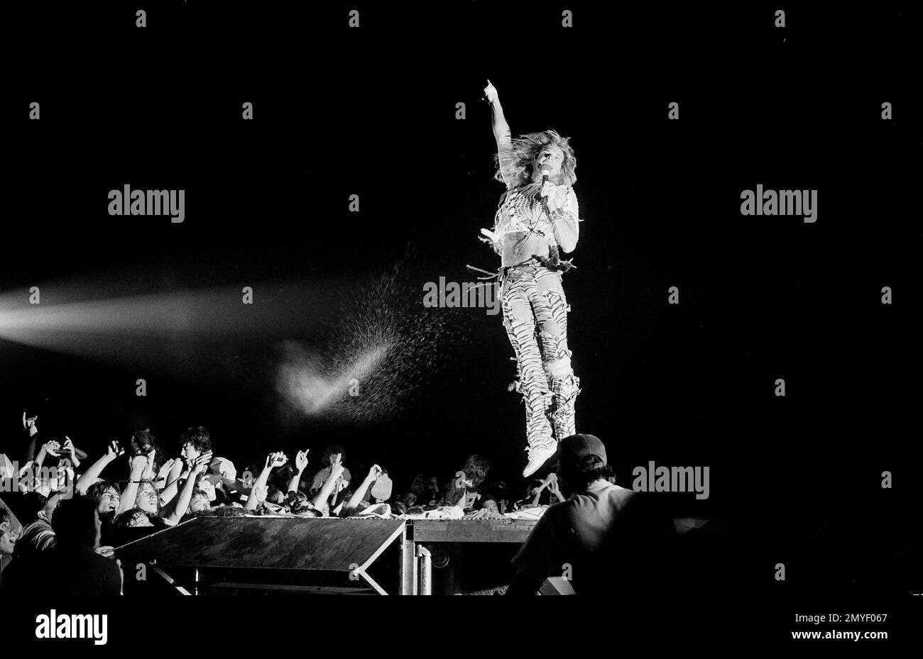 Van Halen lead singer David Lee Roth takes to the air during US ...