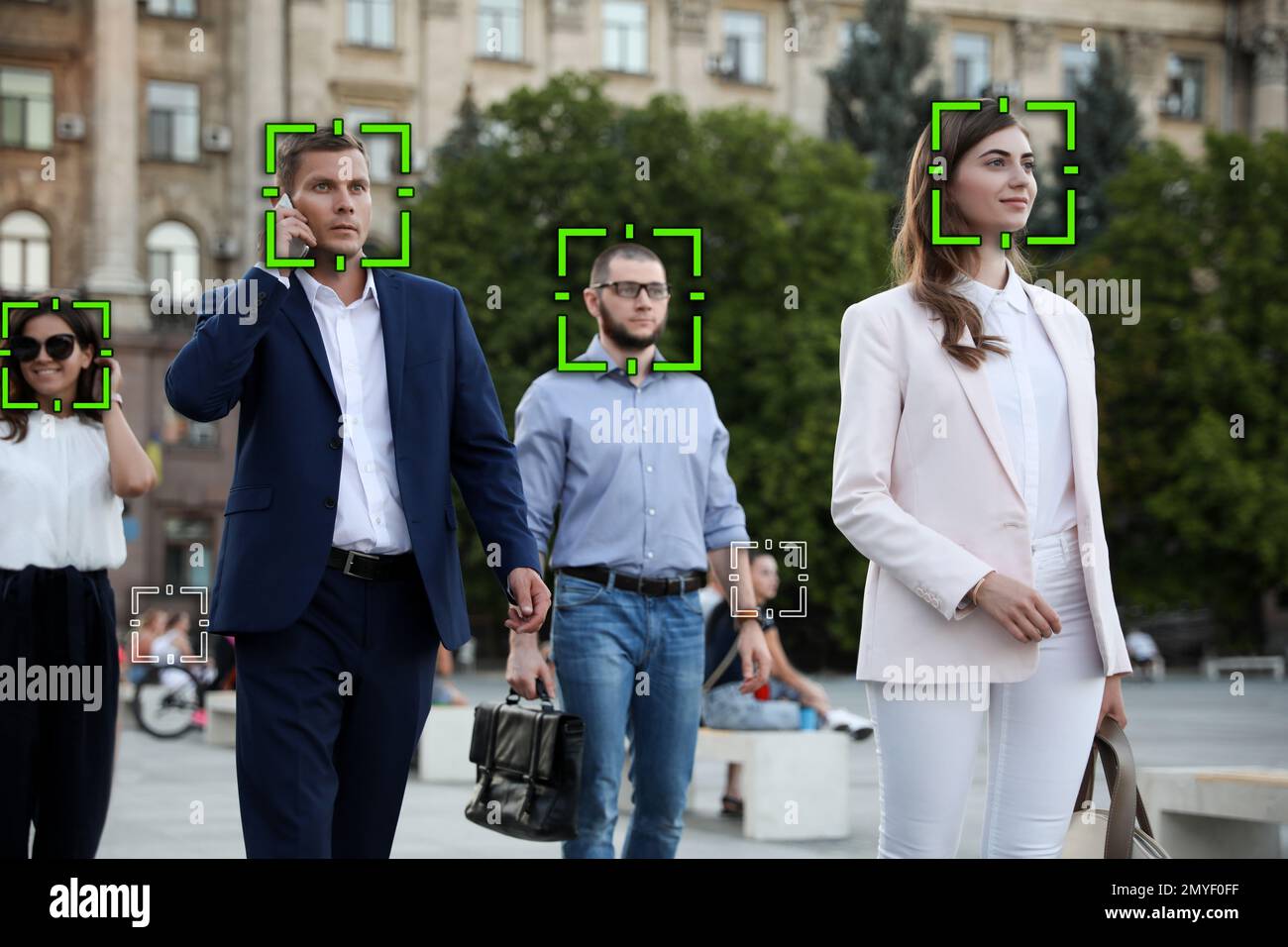 Facial recognition system identifying people on city street Stock Photo ...