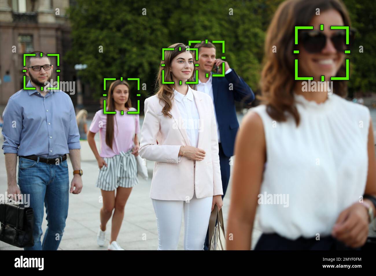 Facial recognition system identifying people on city street Stock Photo ...