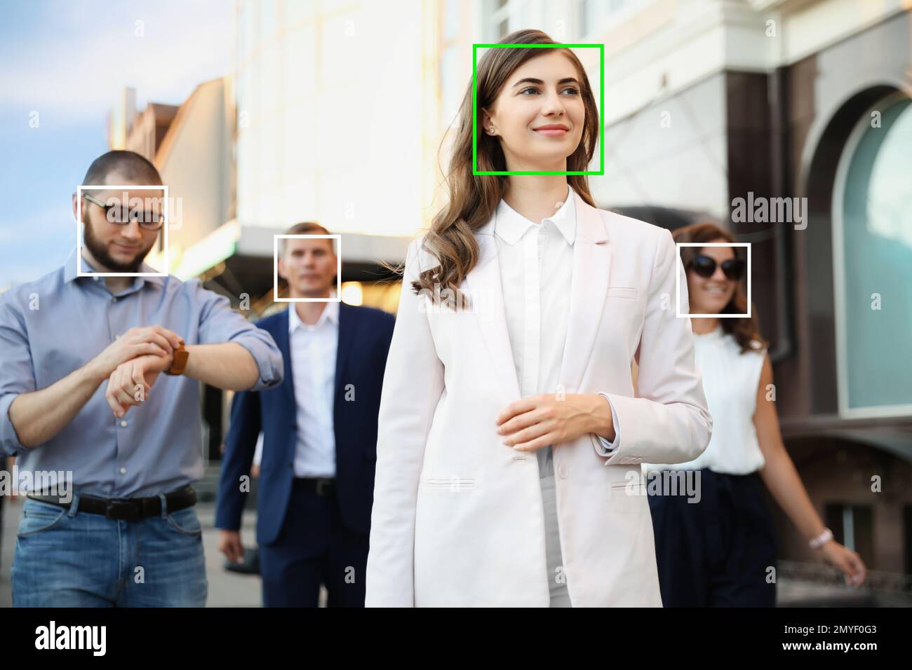 Facial recognition system identifying people on city street Stock Photo ...